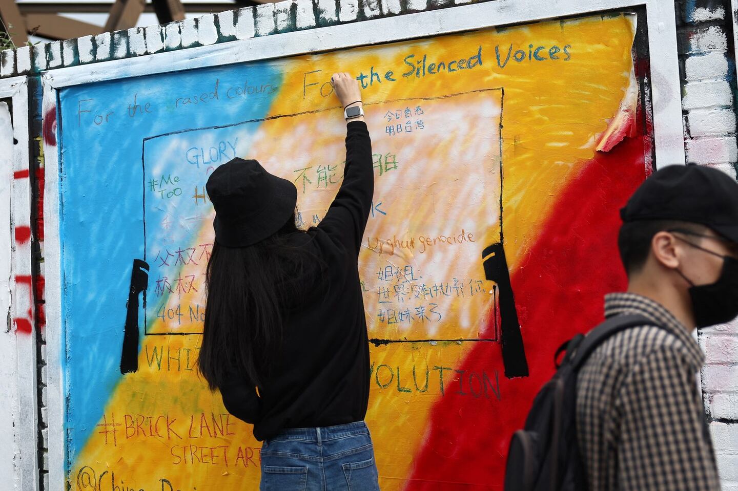 Chinese Communist Party slogans spark graffiti war on London's Brick ...