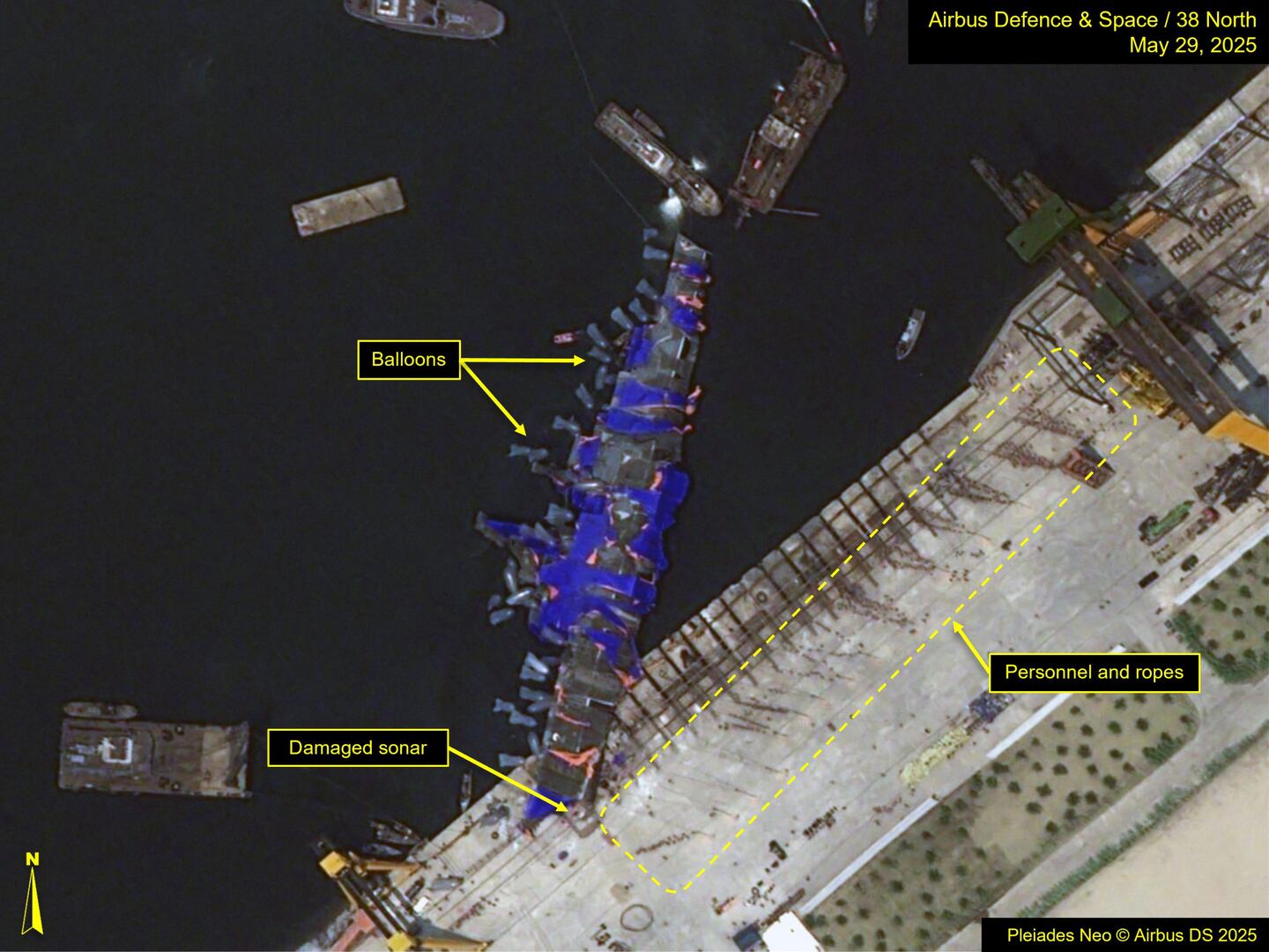 North Korean warship that tipped over during launch is upright again ...