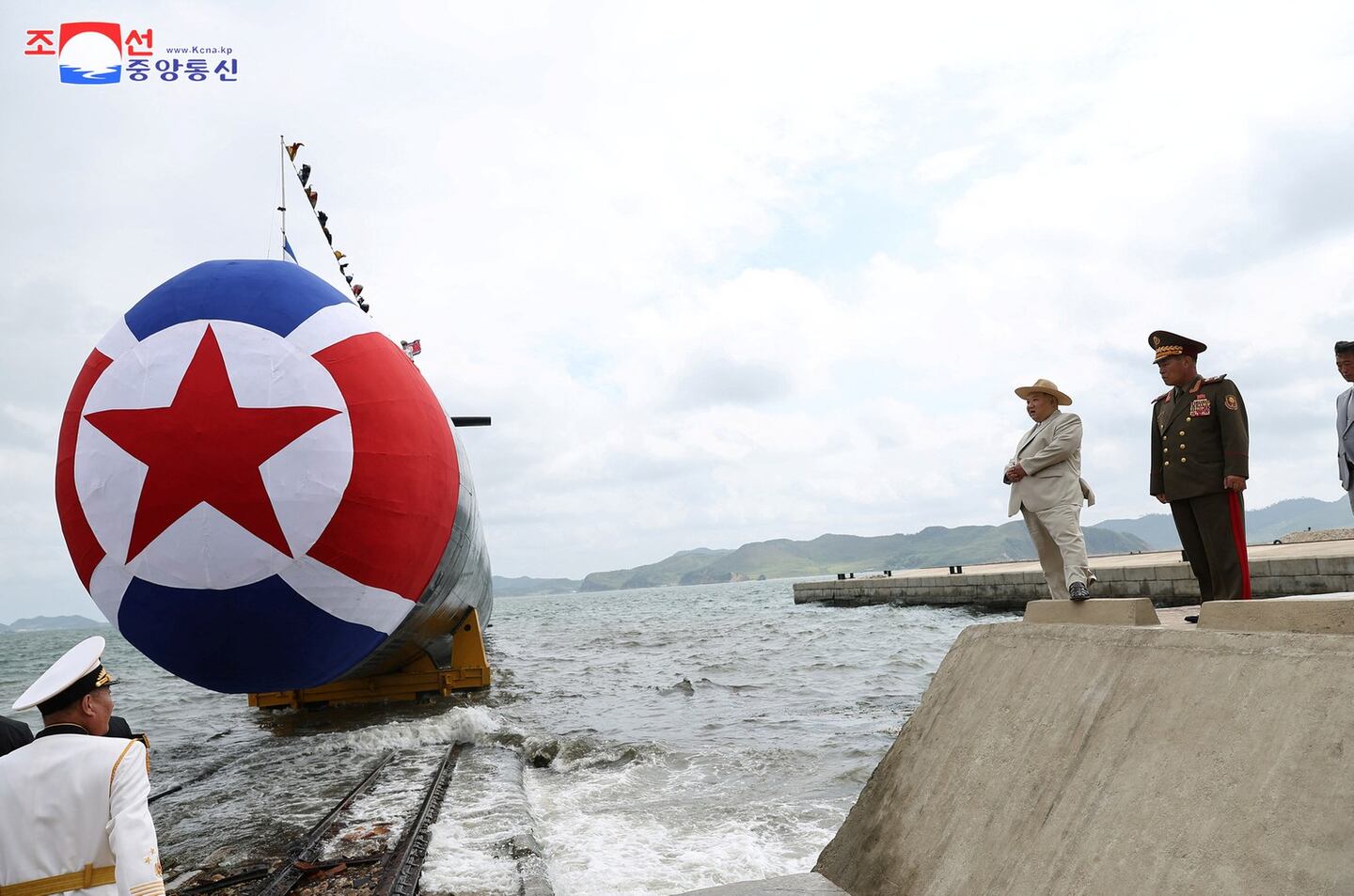 North Korea warns of underwater nuke attack as new submarine unveiled ...