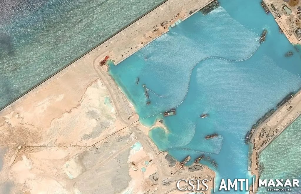 South China Sea: Massive chunk of coral reef destroyed by island ...