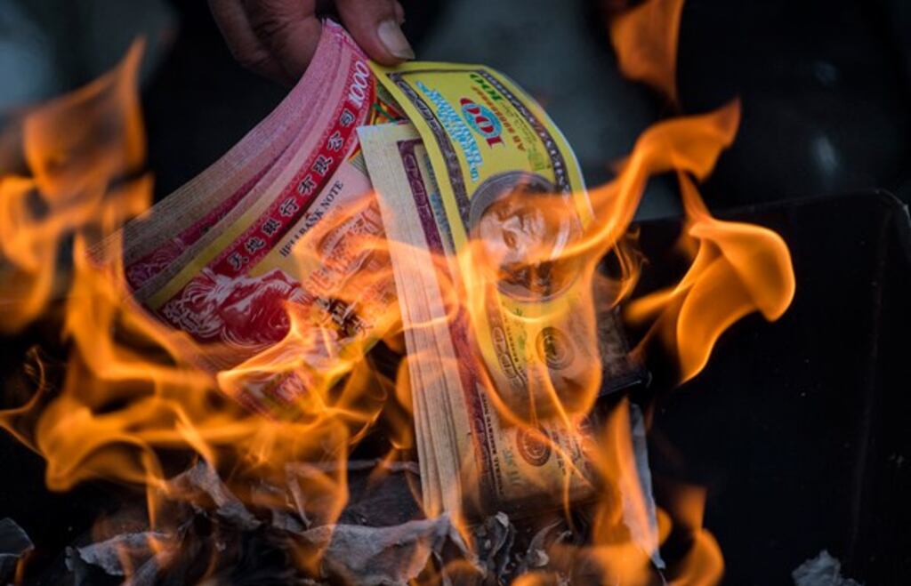 Chinese cities ban burning of 'ghost money' ahead of grave festival ...